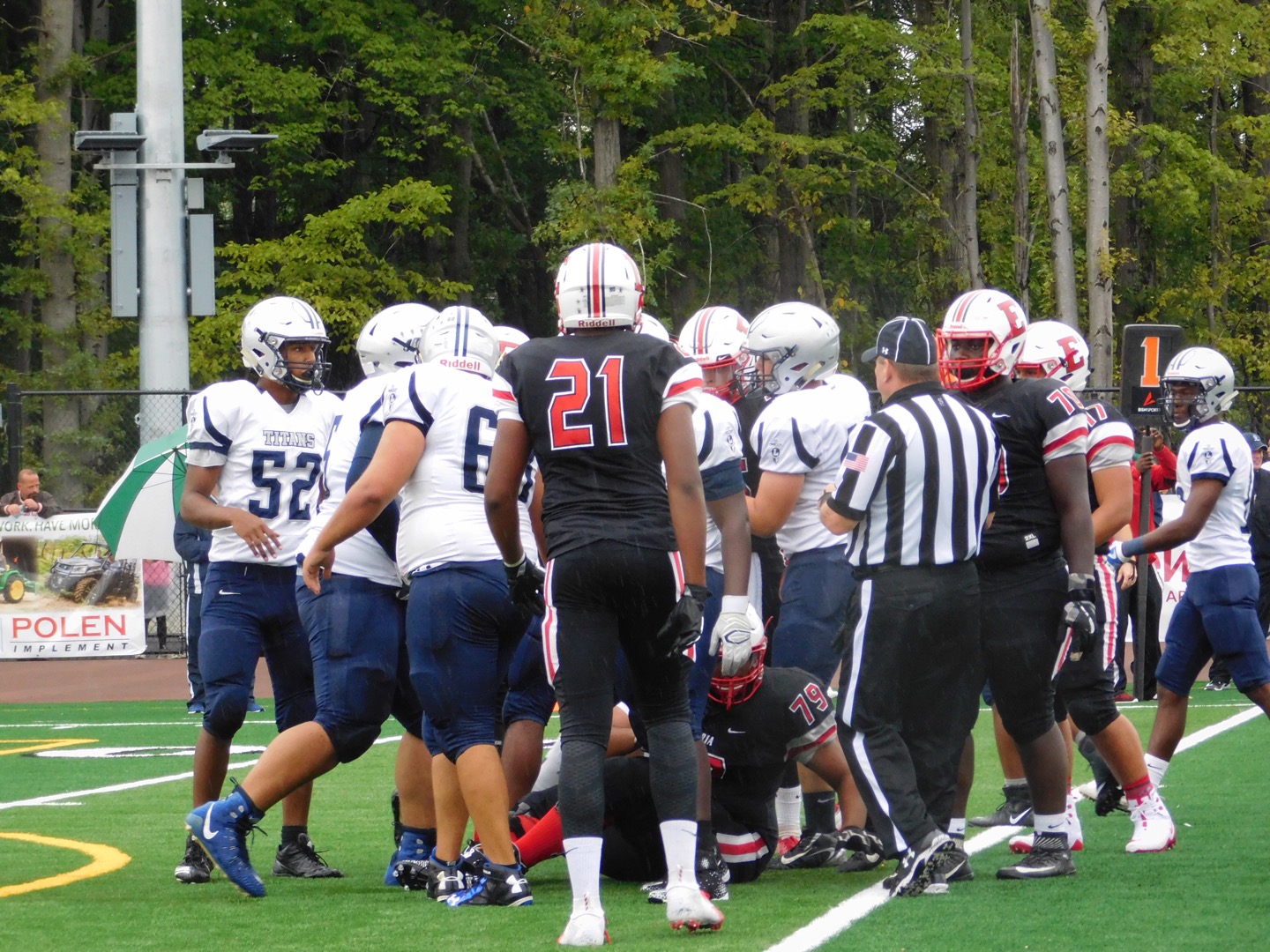 Lorain Titans Run Past Elyria Pioneers 40-7 in 105th Meeting of Rivals ...